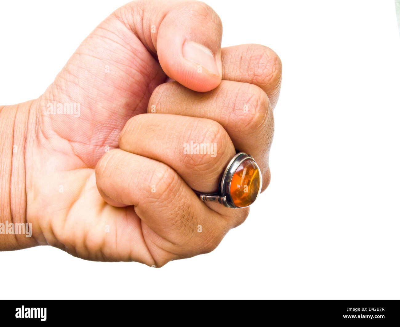 A guy hand with amber ring on his finger isolated on white background ...