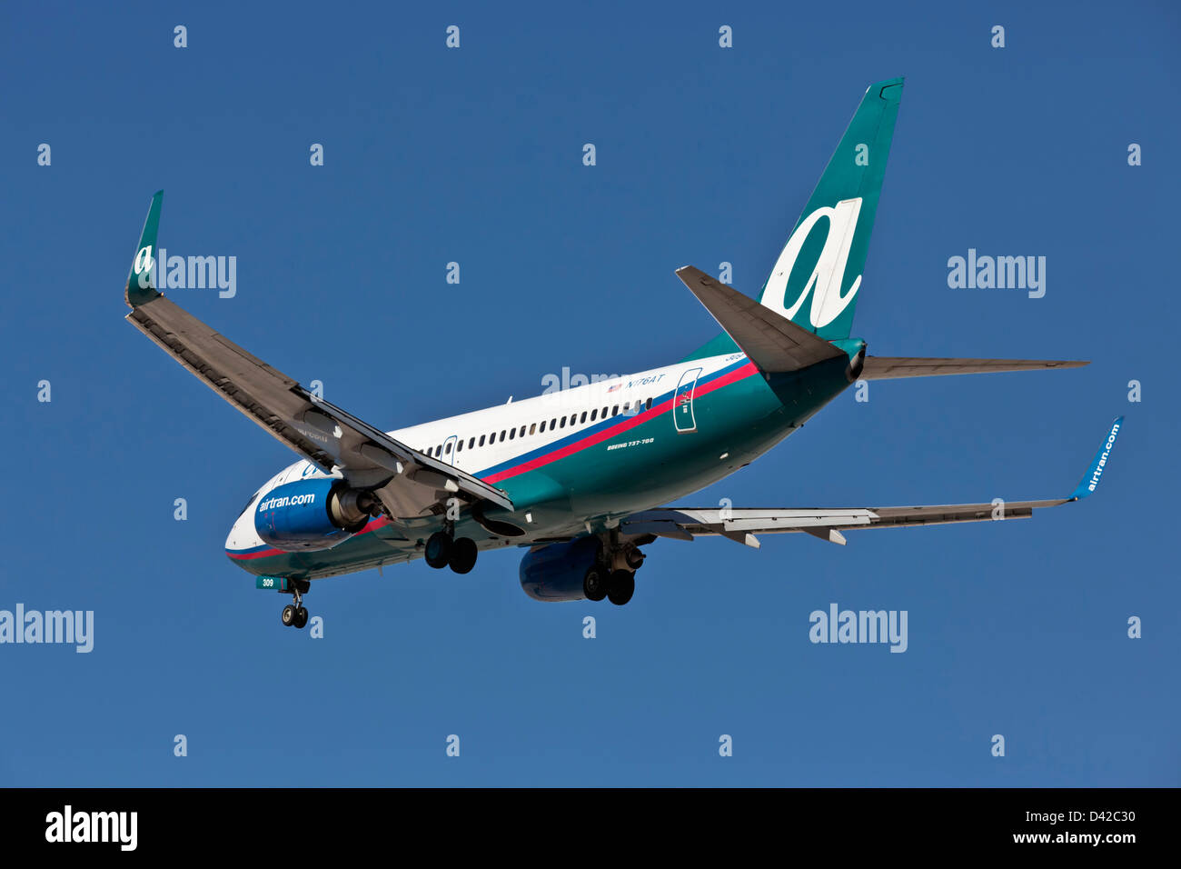 A Boeing 737 of Air Tran airlines on final approach Stock Photo - Alamy