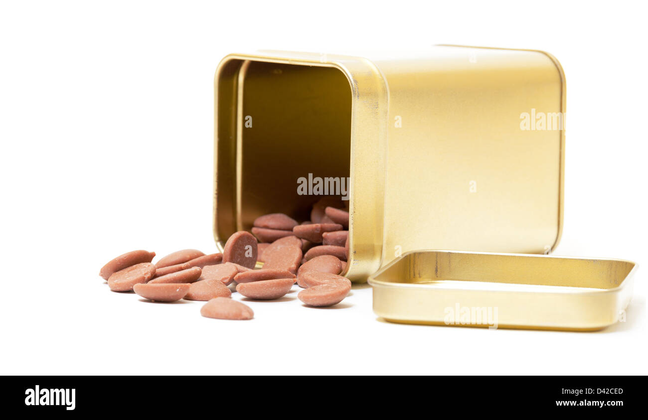 Chocolate Candies in tin can, on white background Stock Photo - Alamy