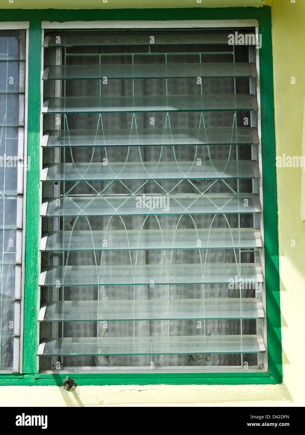 An opened glass lourve window Stock Photo - Alamy