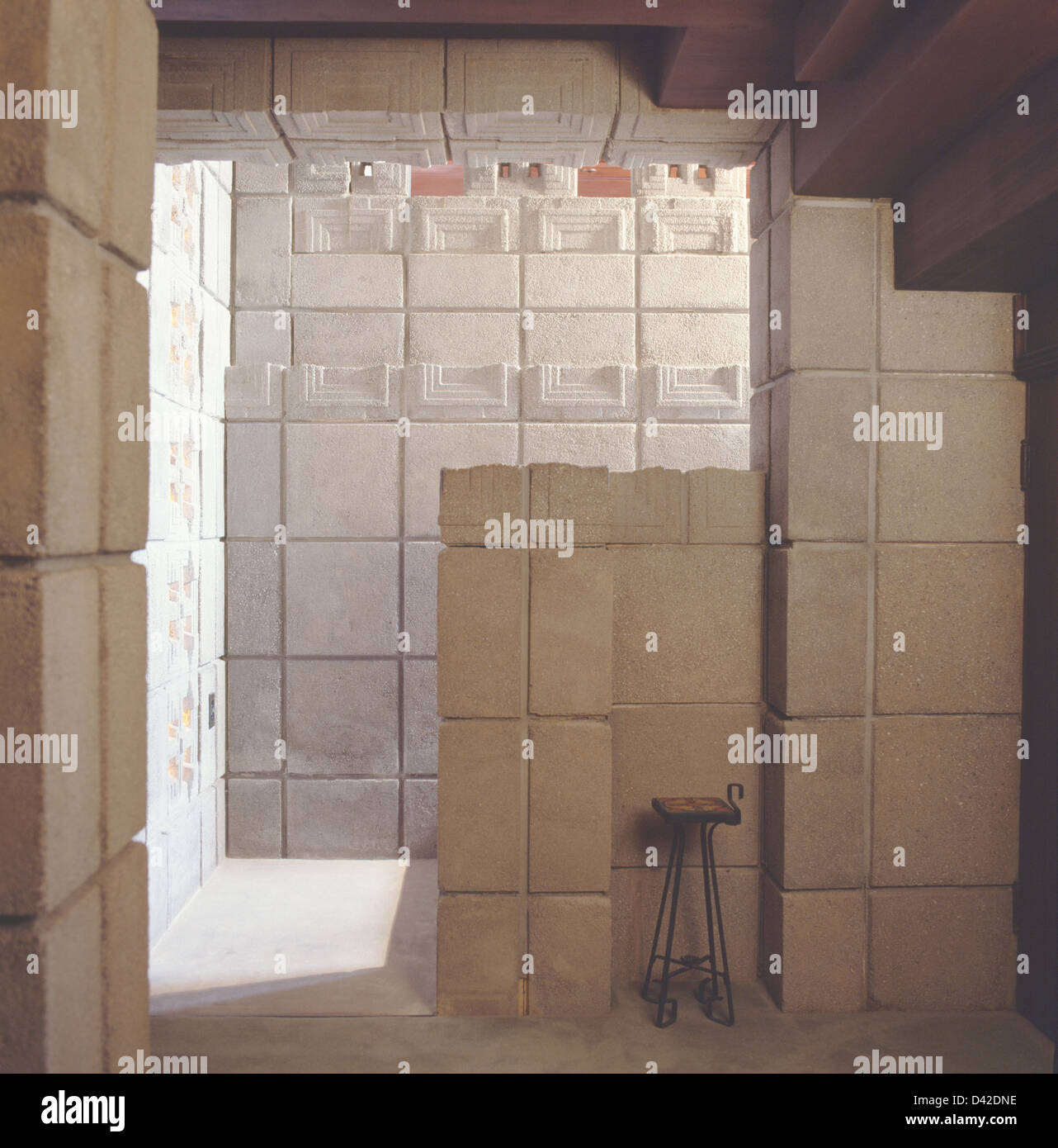 Textile-block walls in the hall of the "Mayan Revival" Storer House ...