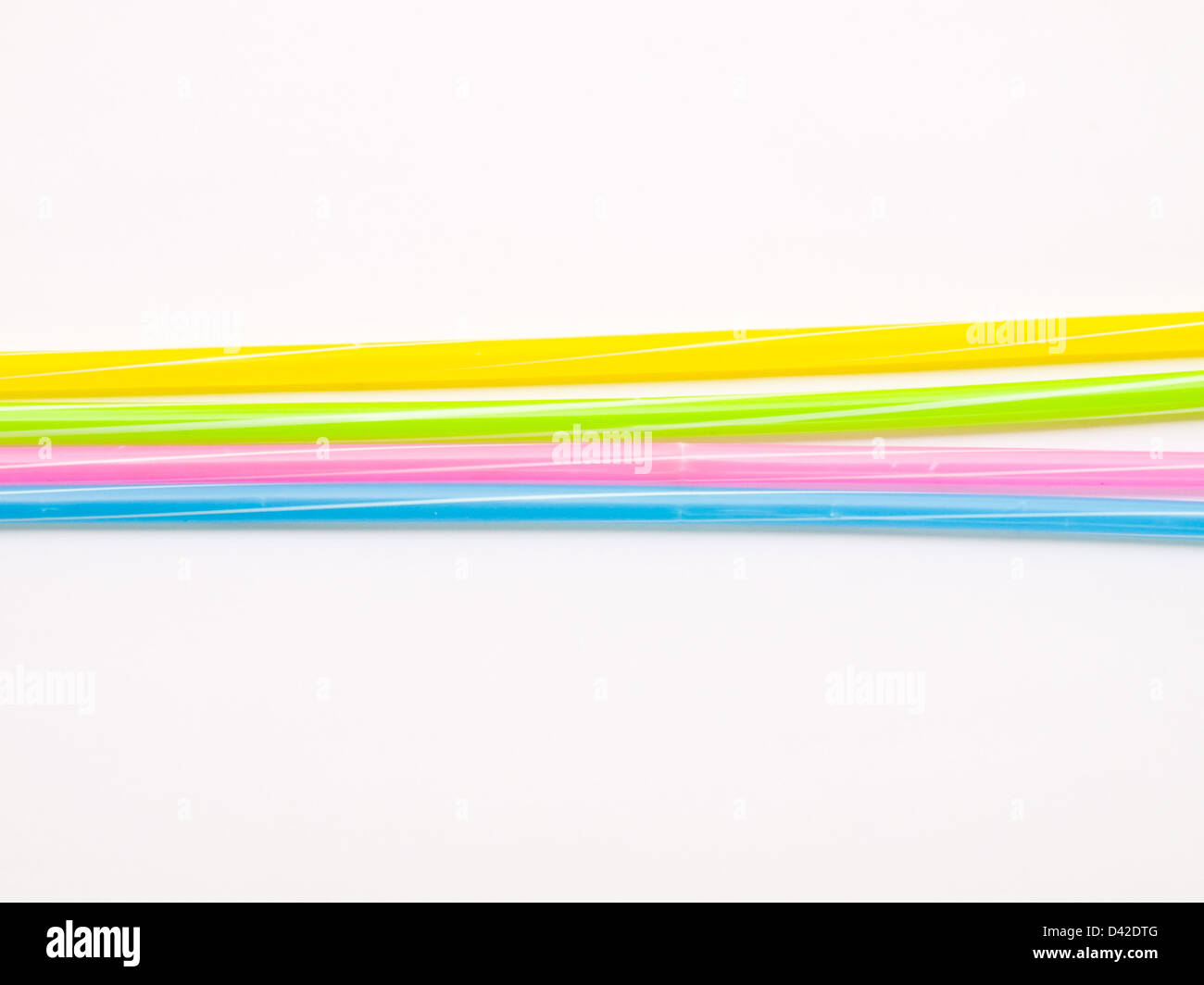 Colorful straws isolated on white background Stock Photo - Alamy