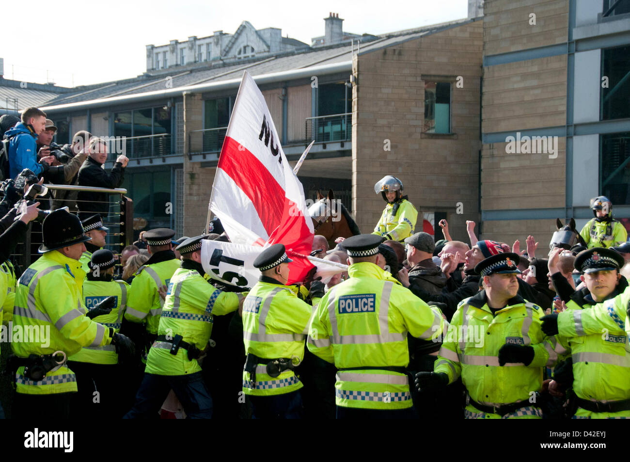 Manchester, UK. 02/03/13. Members of the far-right English Defence ...