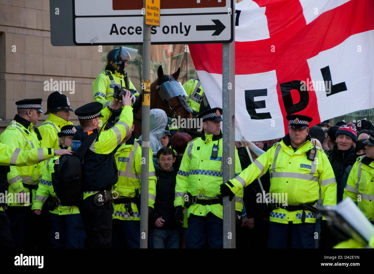 Manchester, UK. 02/03/13. Members of the far-right English Defence ...