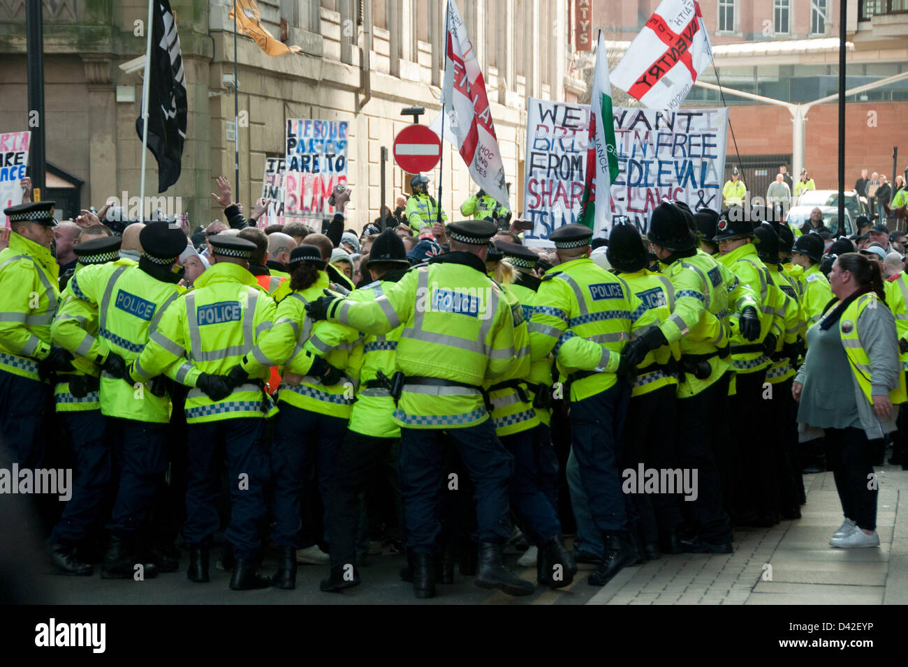 Manchester, UK. 02/03/13. Members of the far-right English Defence ...