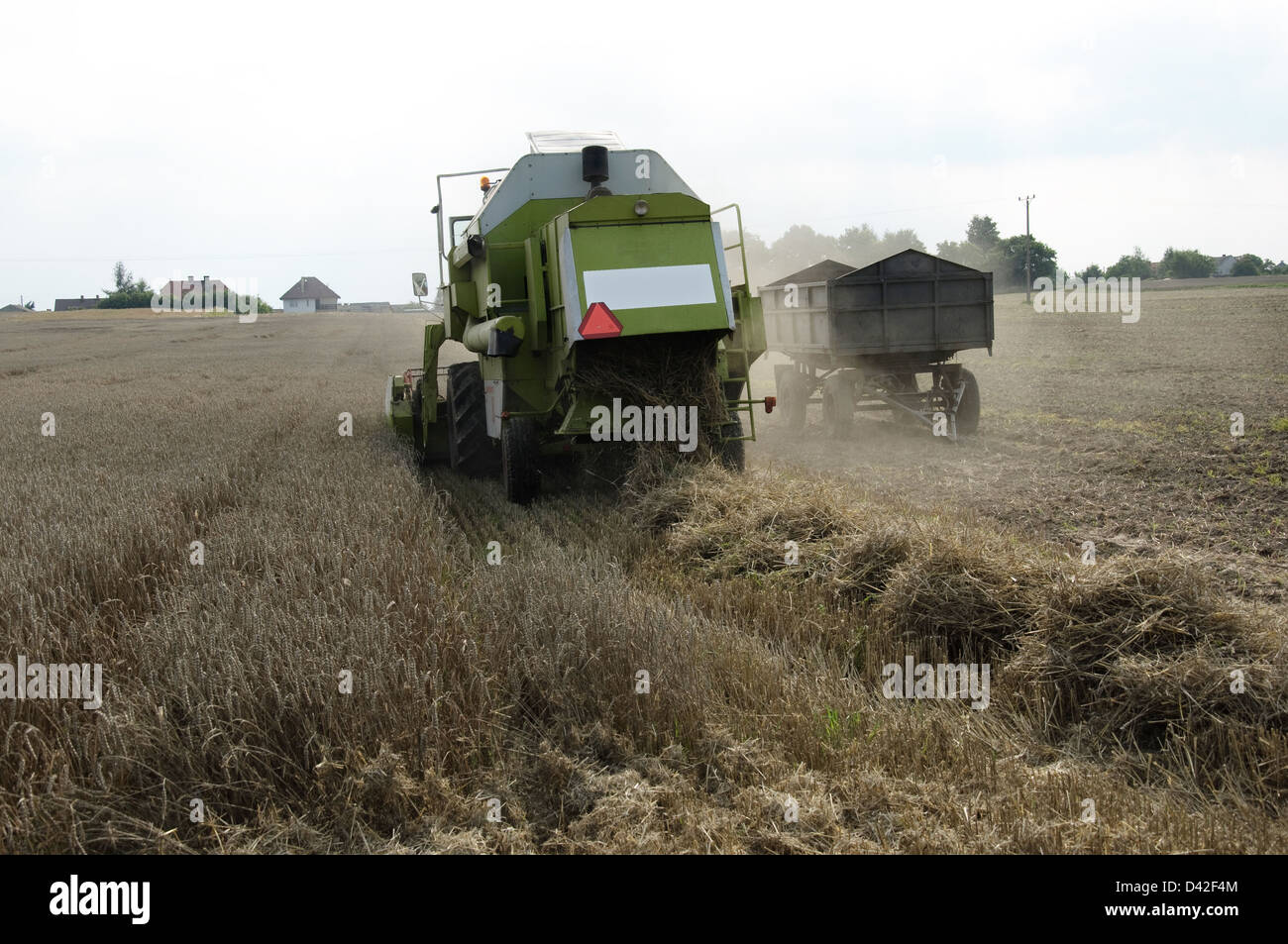 Photo of combine harvesting crops Stock Photo - Alamy