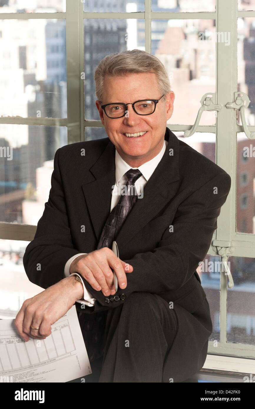 Mature Executive in Urban Office Stock Photo - Alamy