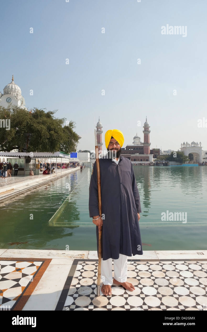 A uniformed Temple Guard with spear at the Golden Temple complex in ...
