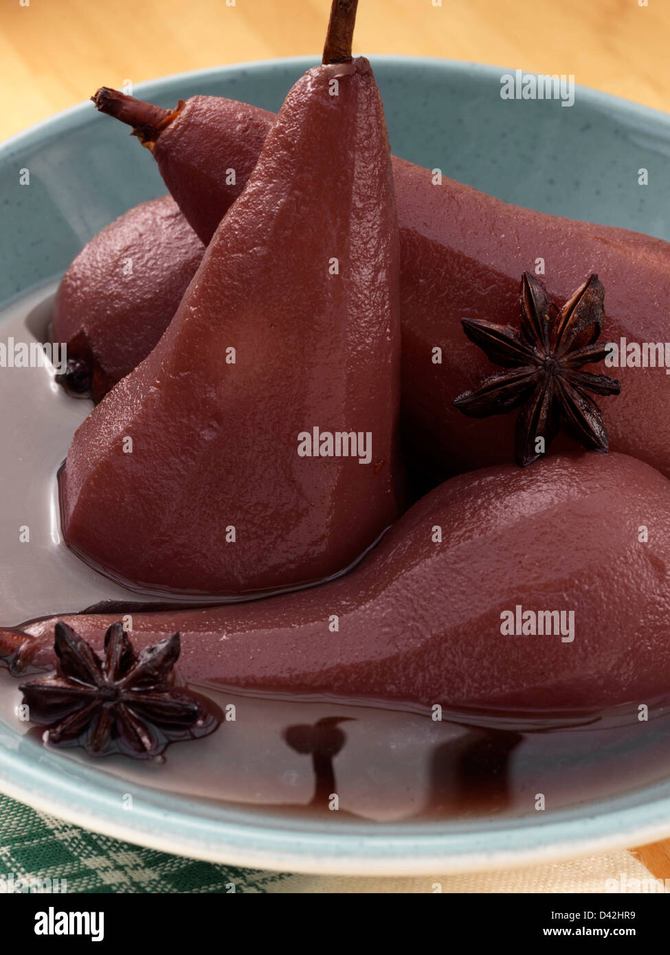 Whole peeled port poached pears hi-res stock photography and images - Alamy