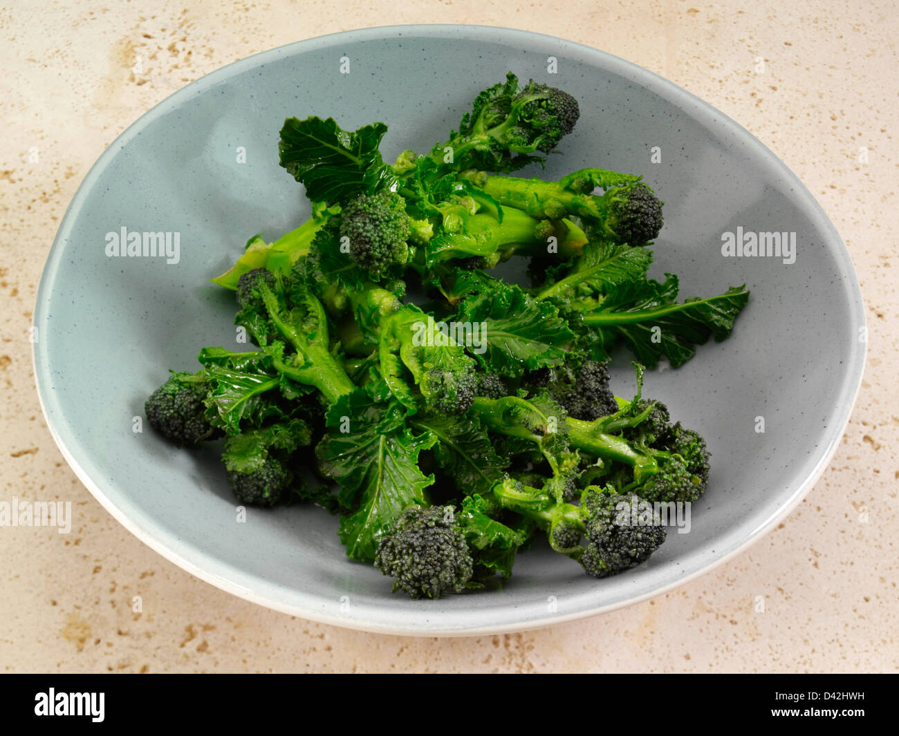 Purple sprouting broccoli cooked Stock Photo - Alamy
