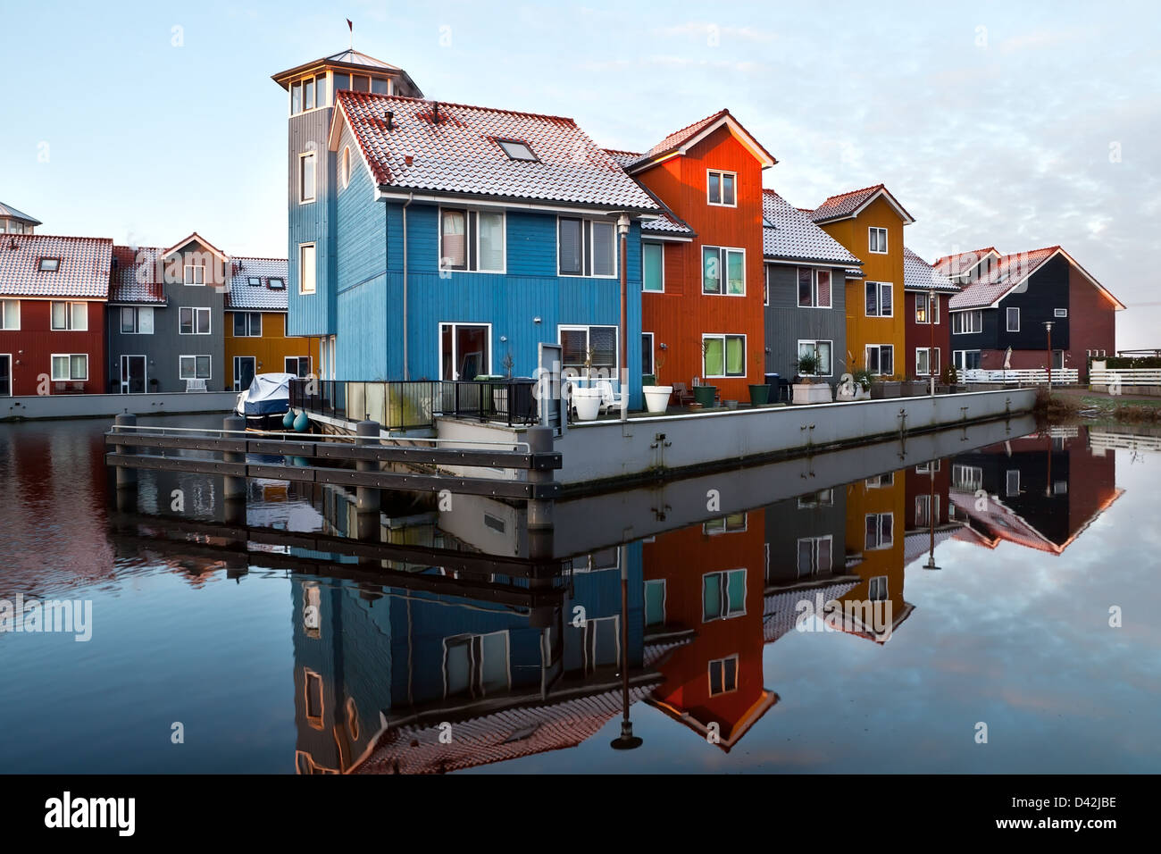Dutch colorful buildings on water at sunrise, Netherlands Stock Photo ...