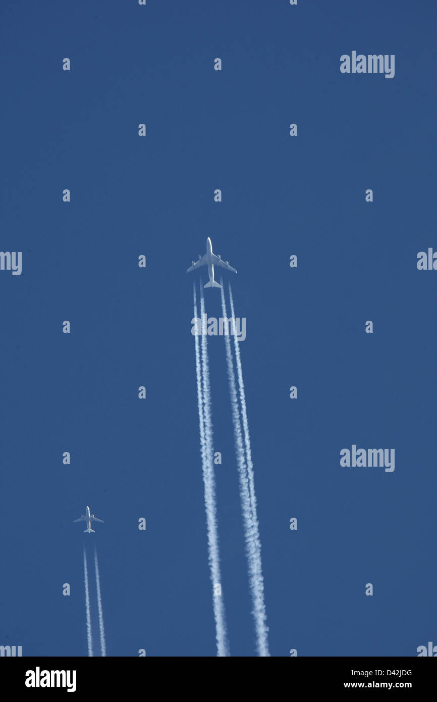Leipzig, Germany, planes in the sky with contrails Stock Photo - Alamy