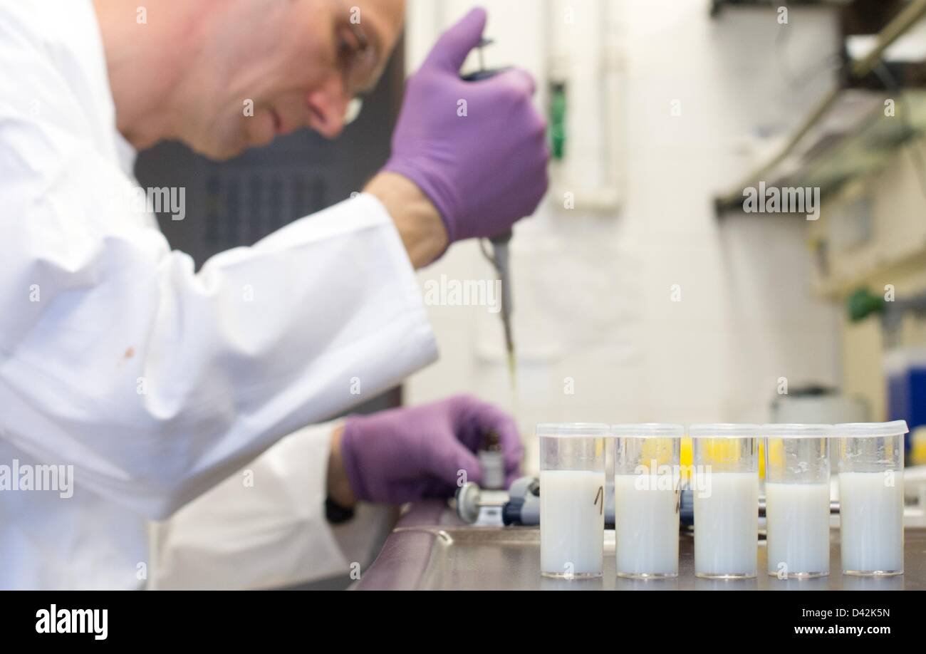 A chemical engineer sorts raw milk samples at the Lower Saxony State ...