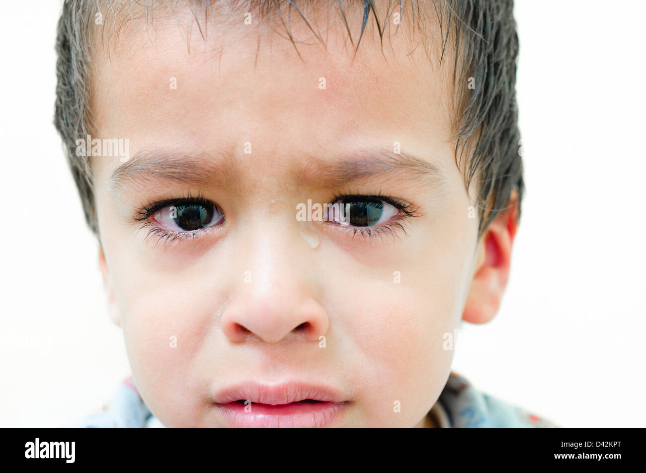 One lonely child weeping on white background Stock Photo - Alamy