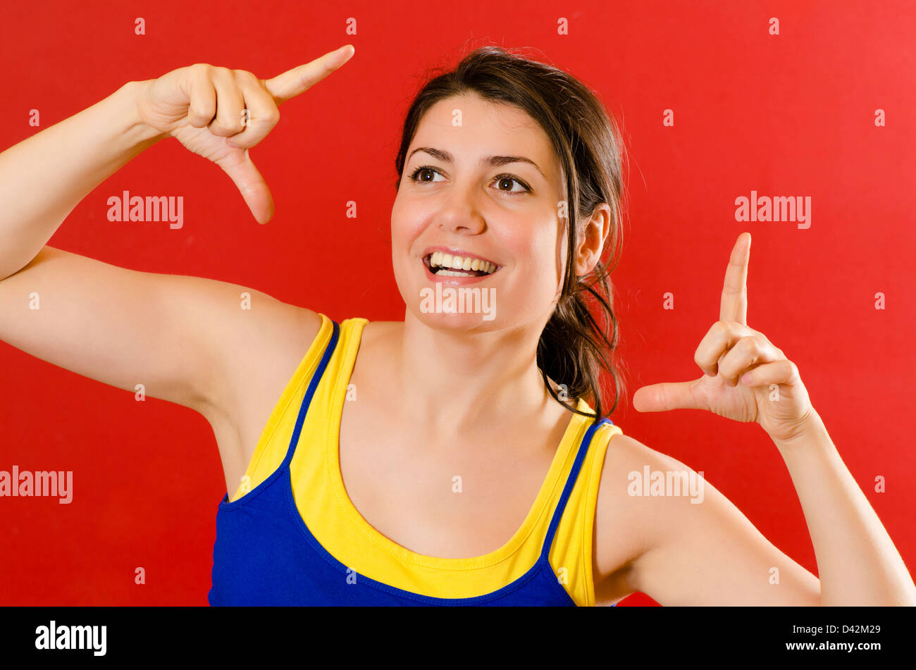 Pretty girl making frame hands hi-res stock photography and images - Alamy