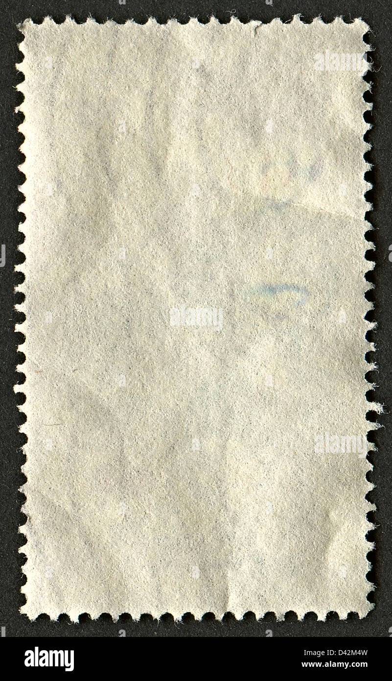 The reverse side of a postage stamp Stock Photo - Alamy