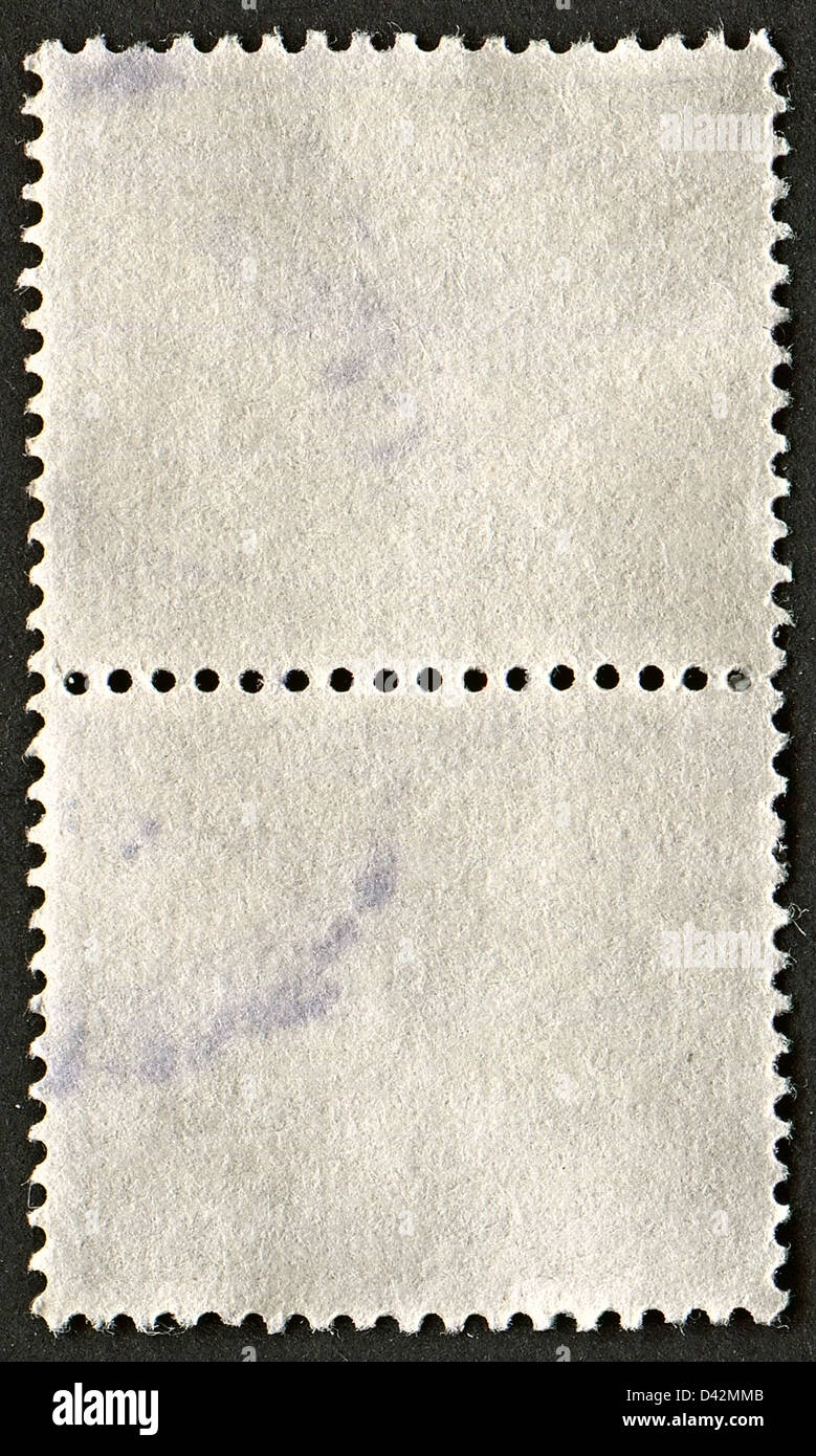 The reverse side of a postage stamp Stock Photo - Alamy