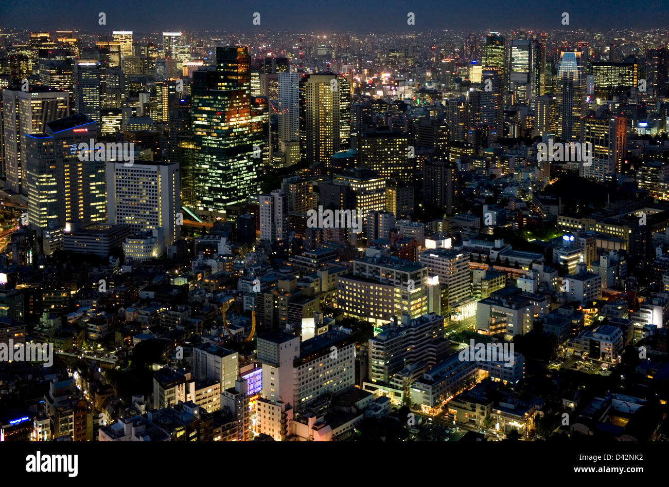 Night time aerial view of metropolitan downtown Tokyo city skyline with ...