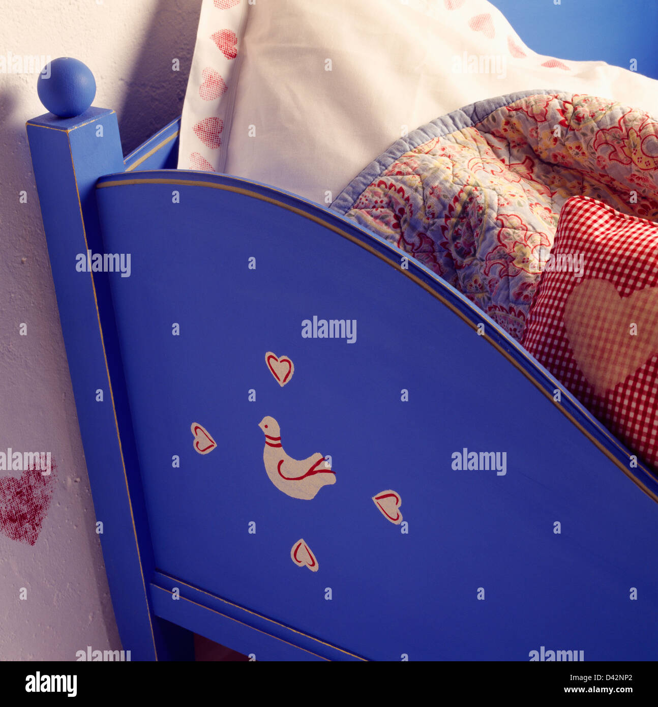 Bright blue cushions on bed hi-res stock photography and images - Alamy