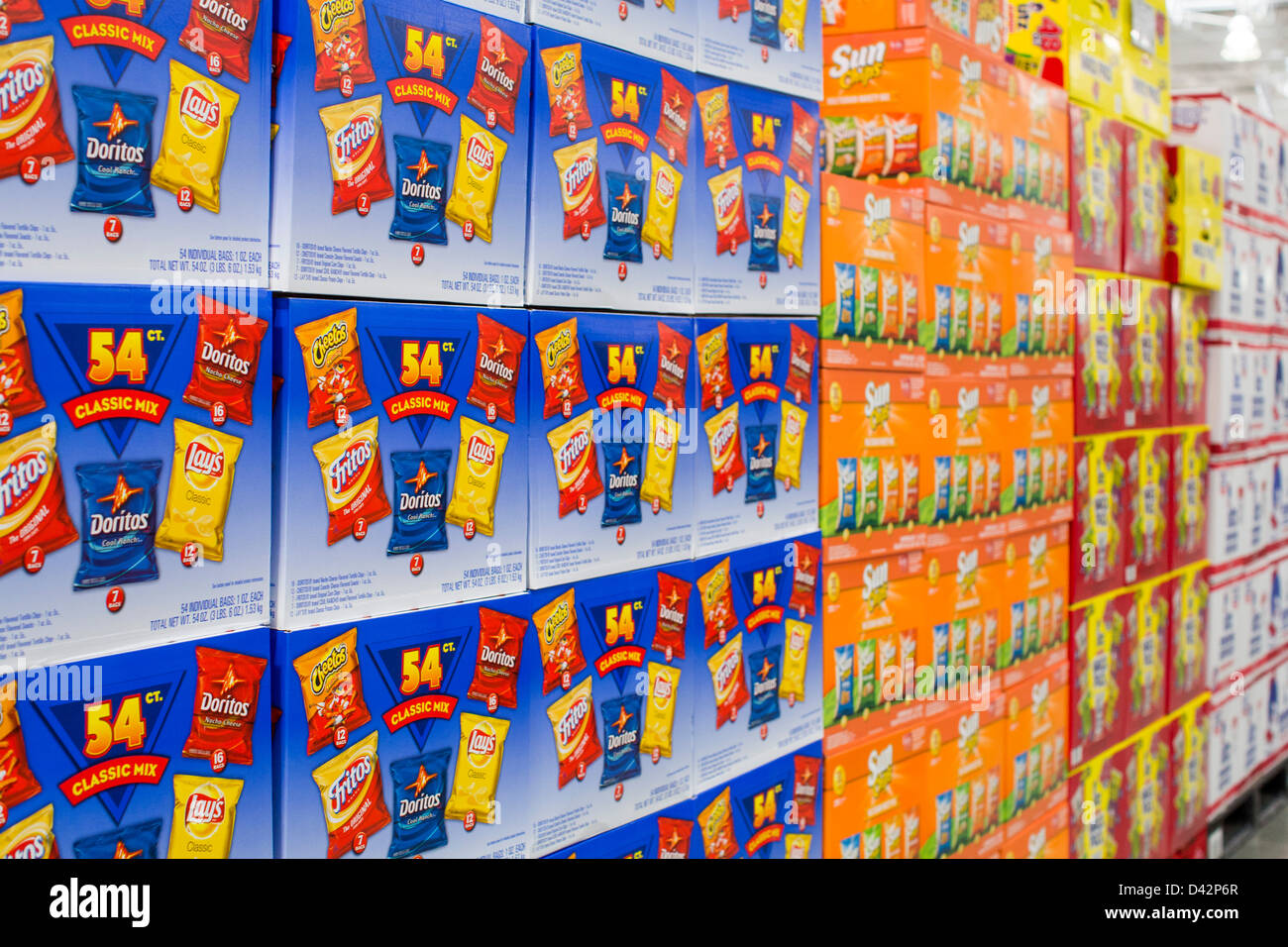 Doritos, Lay's, Cheetos and other snacks on display at a Costco ...