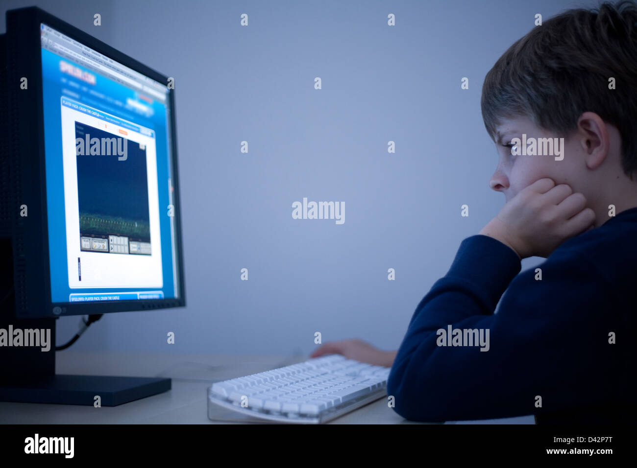Berlin, Germany, a boy playing on the computer Stock Photo - Alamy