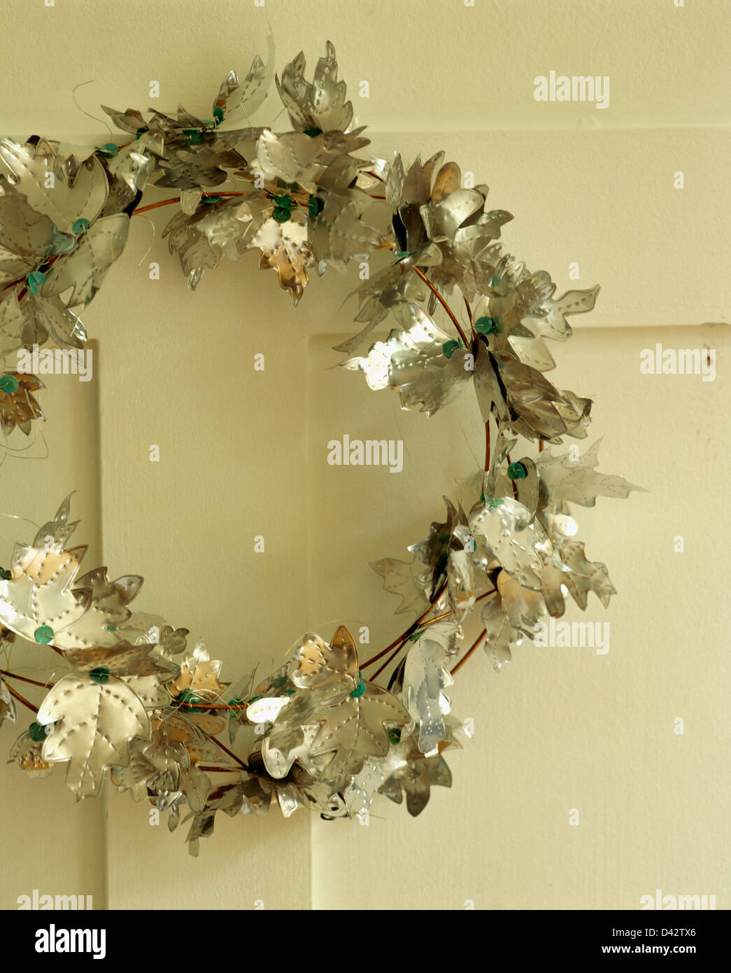 Close-up of Christmas wreath made from punched tin leaves Stock Photo ...