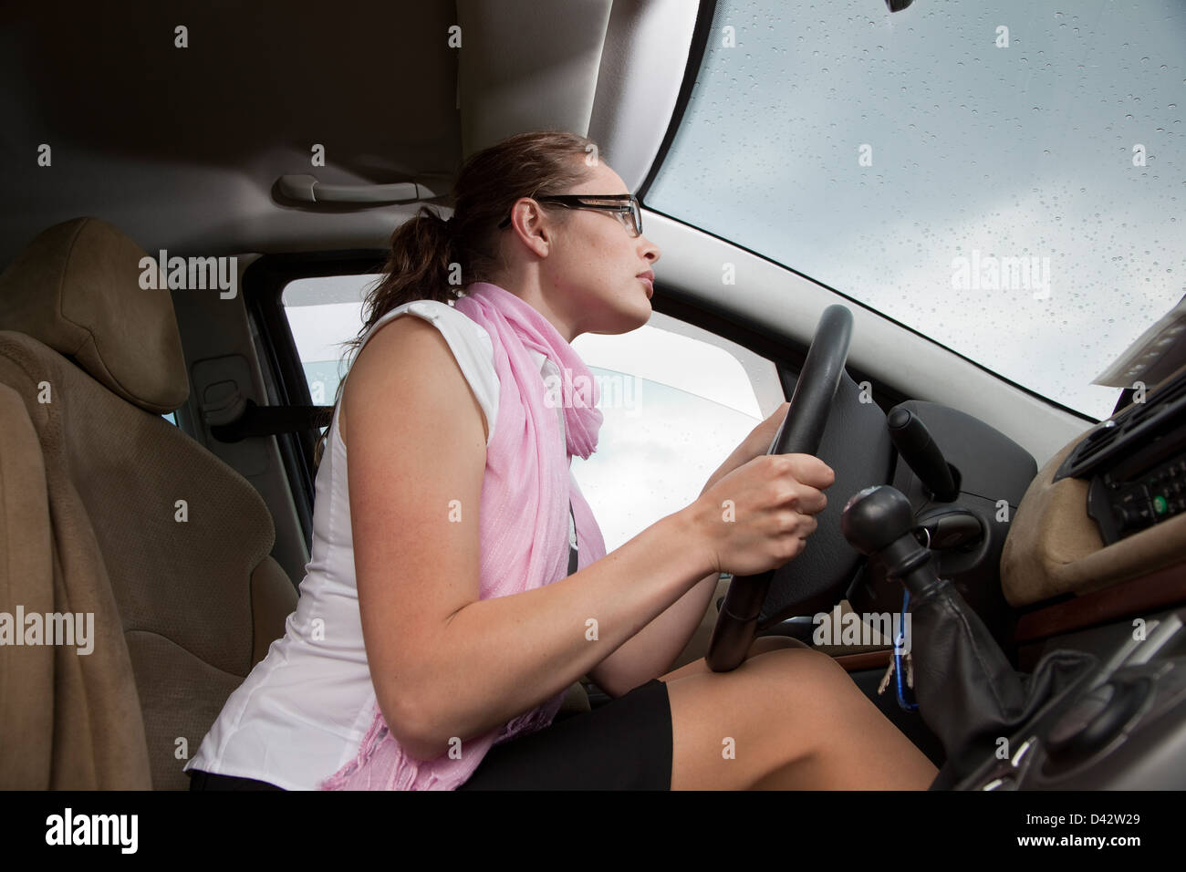 Freiburg, Germany, a young woman driving a car Stock Photo - Alamy