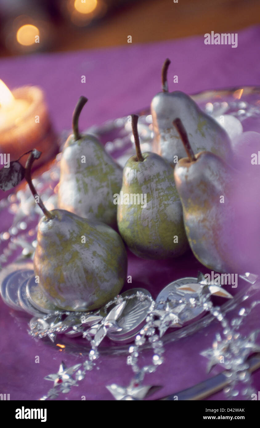 Close-up of fresh pears with silver paint effect Stock Photo - Alamy