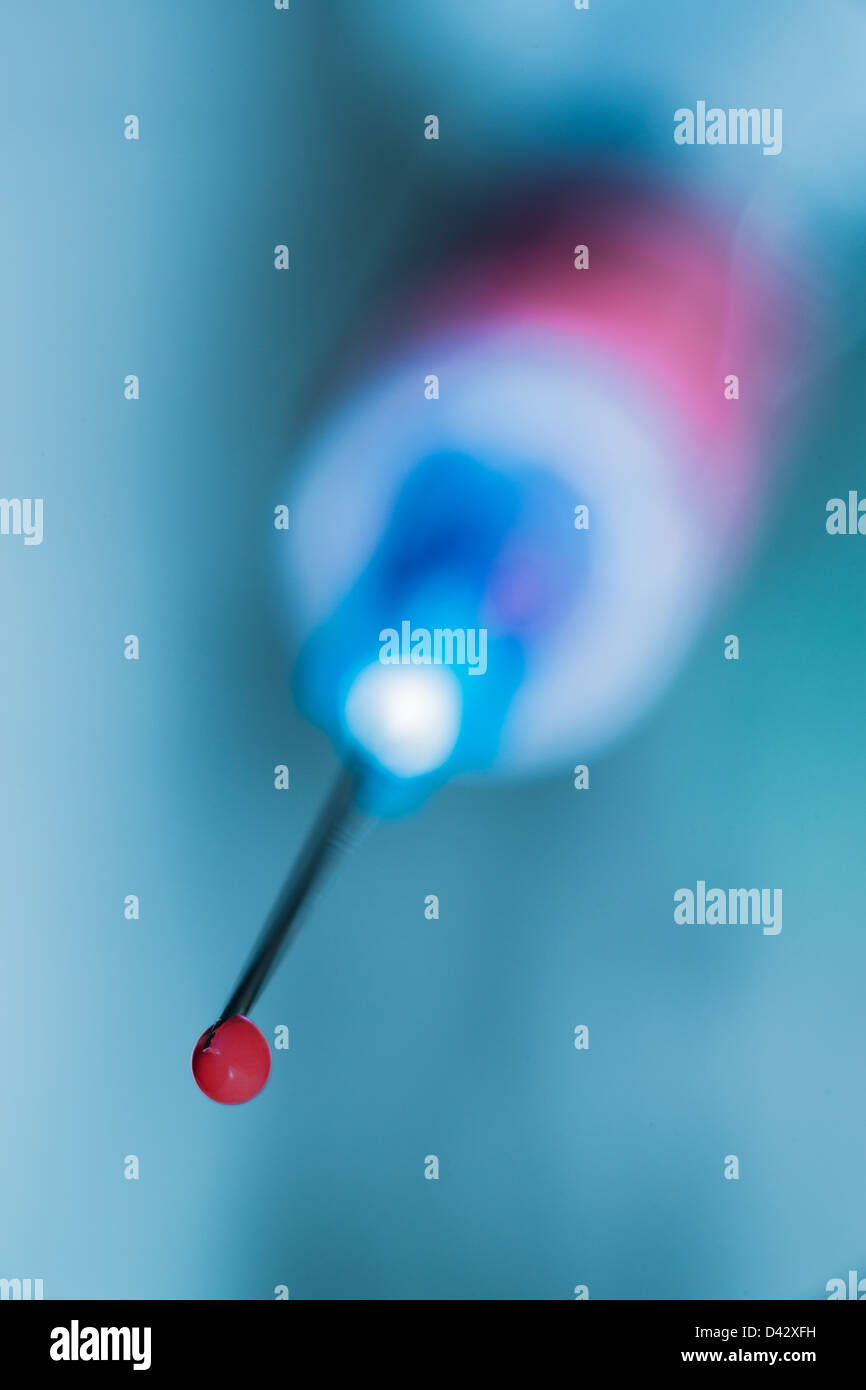 Close up of syringe needle point with drop of blood Stock Photo - Alamy