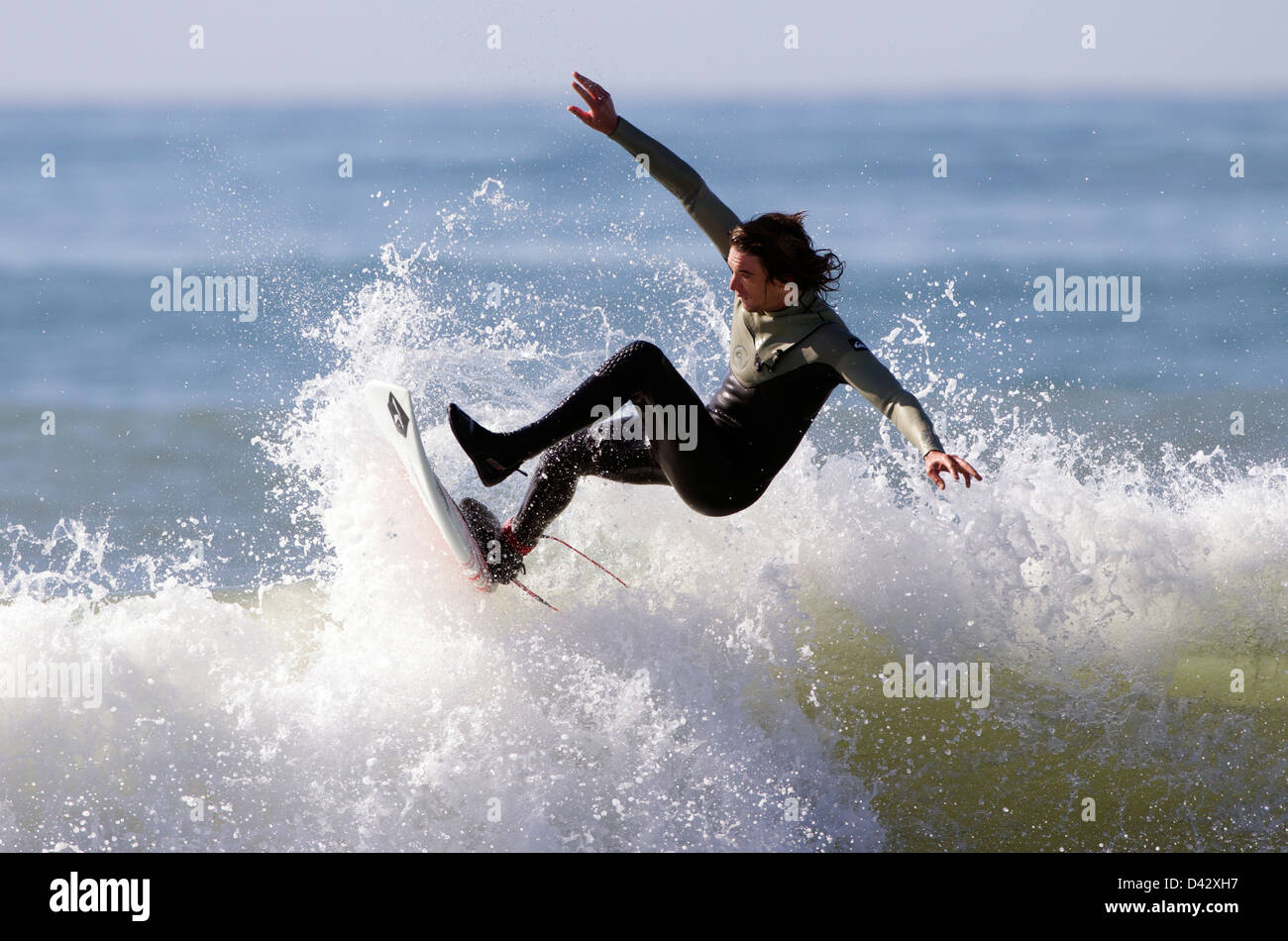 Male surfer doing cool tricks hi-res stock photography and images - Alamy