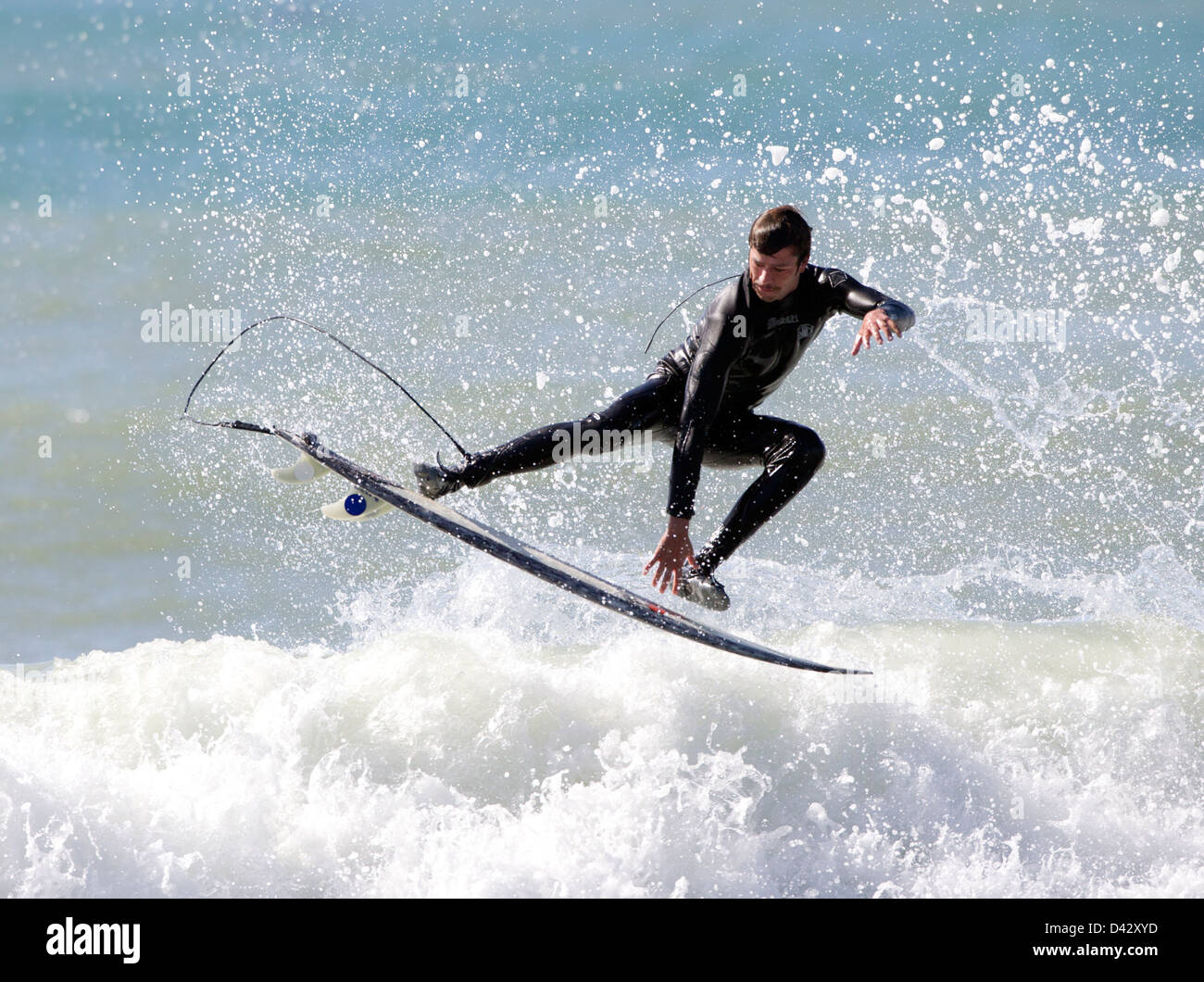 Male surfer doing cool tricks hi-res stock photography and images - Alamy