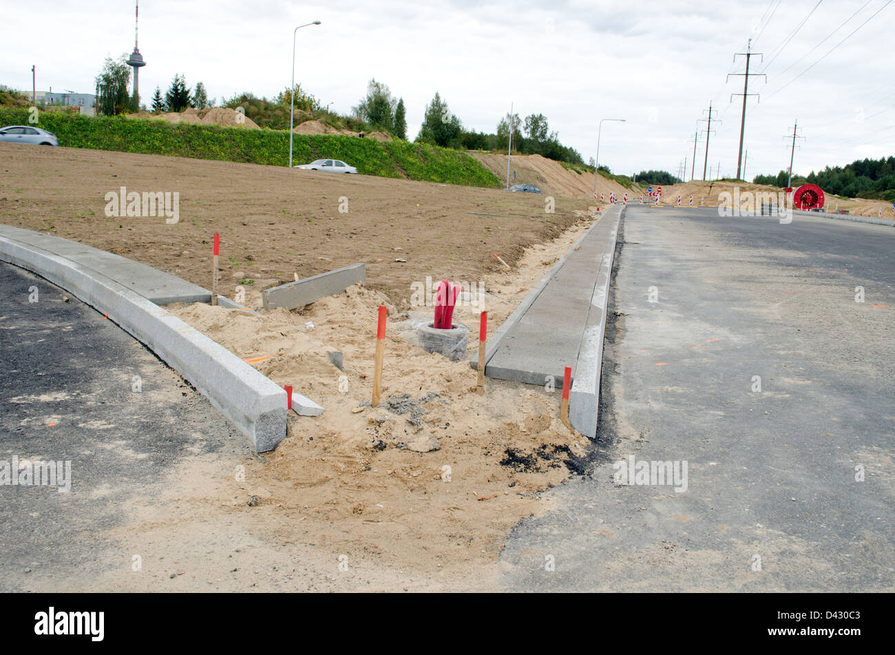 building new road construction site cars going roundabout and lighting ...