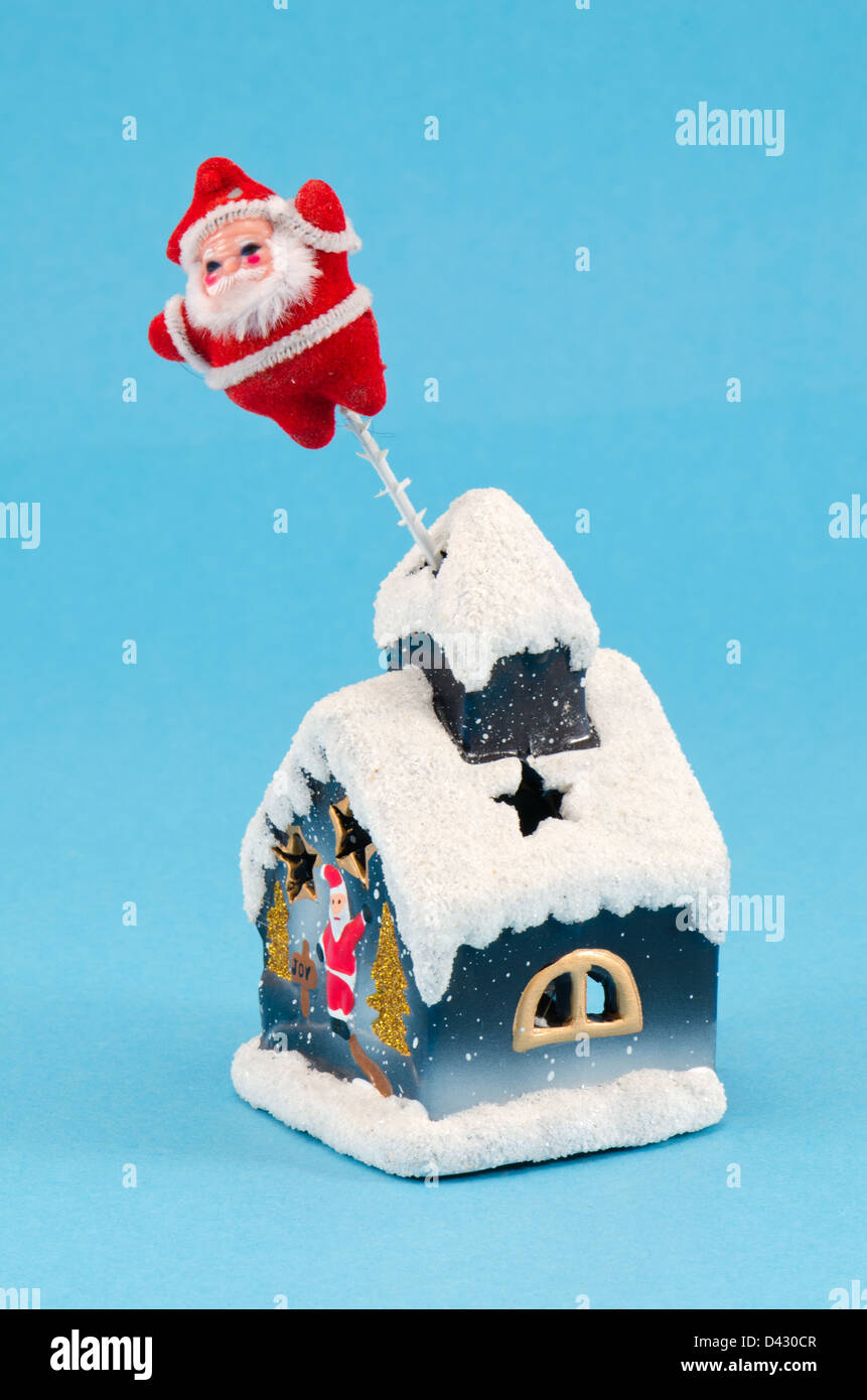 Small blue house santa claus hi-res stock photography and images - Alamy