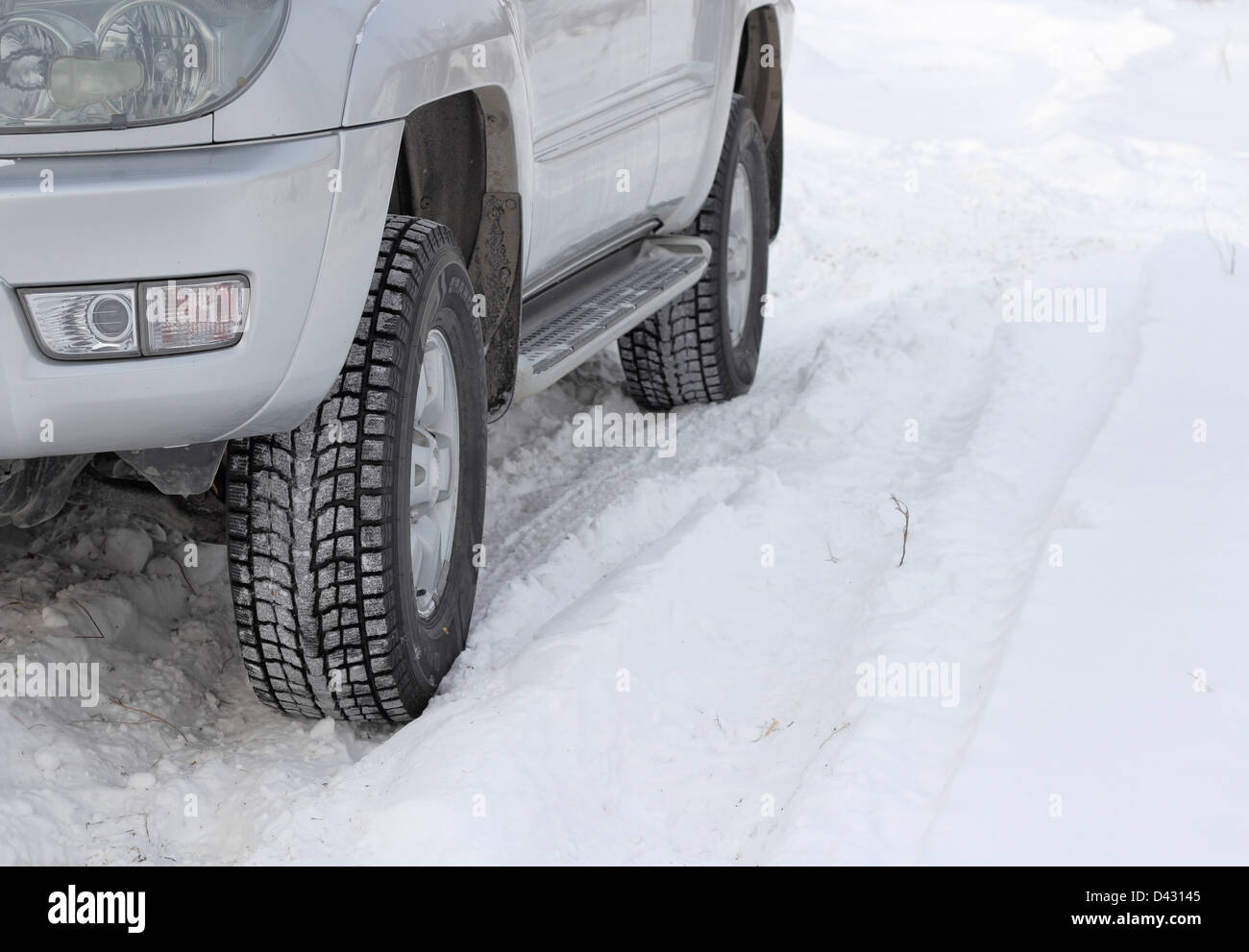 Snowy winter road ahead an unrecognizable car Stock Photo - Alamy