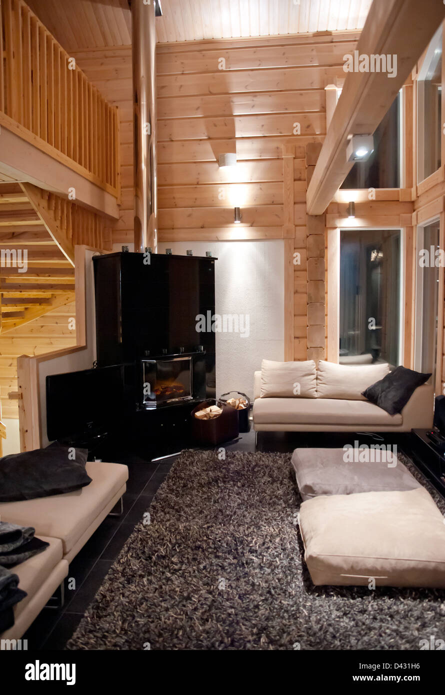 fire place, log house, living room Stock Photo - Alamy