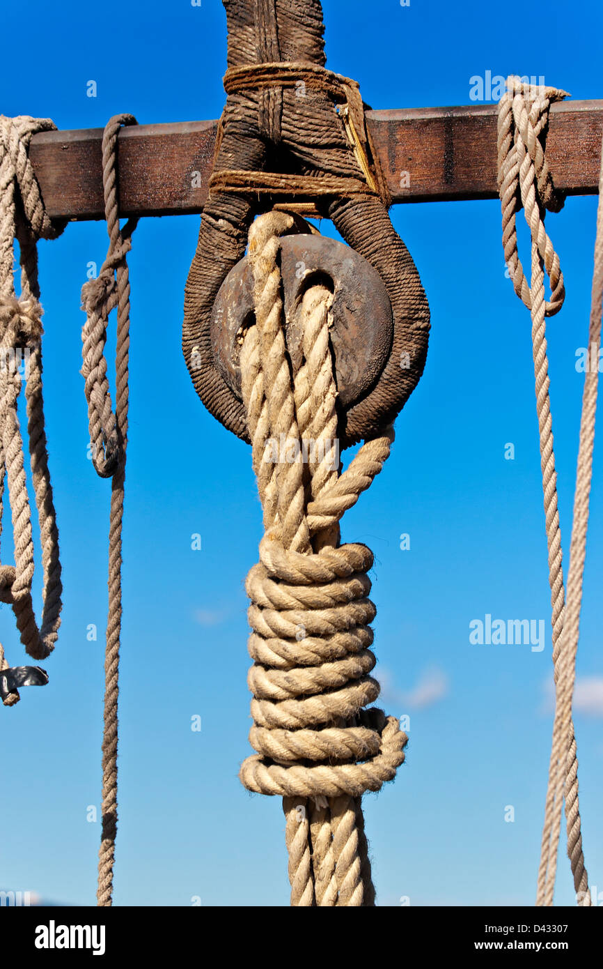 Ancient wooden sailboat deadeye and ropes detail Stock Photo - Alamy