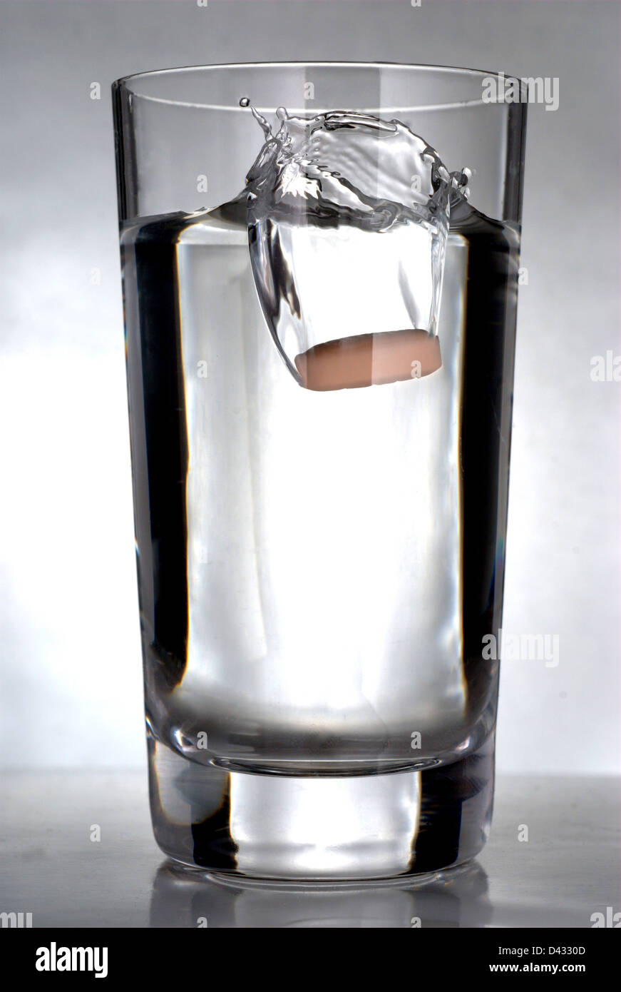 Effervescent tablet falls glass water hi-res stock photography and ...