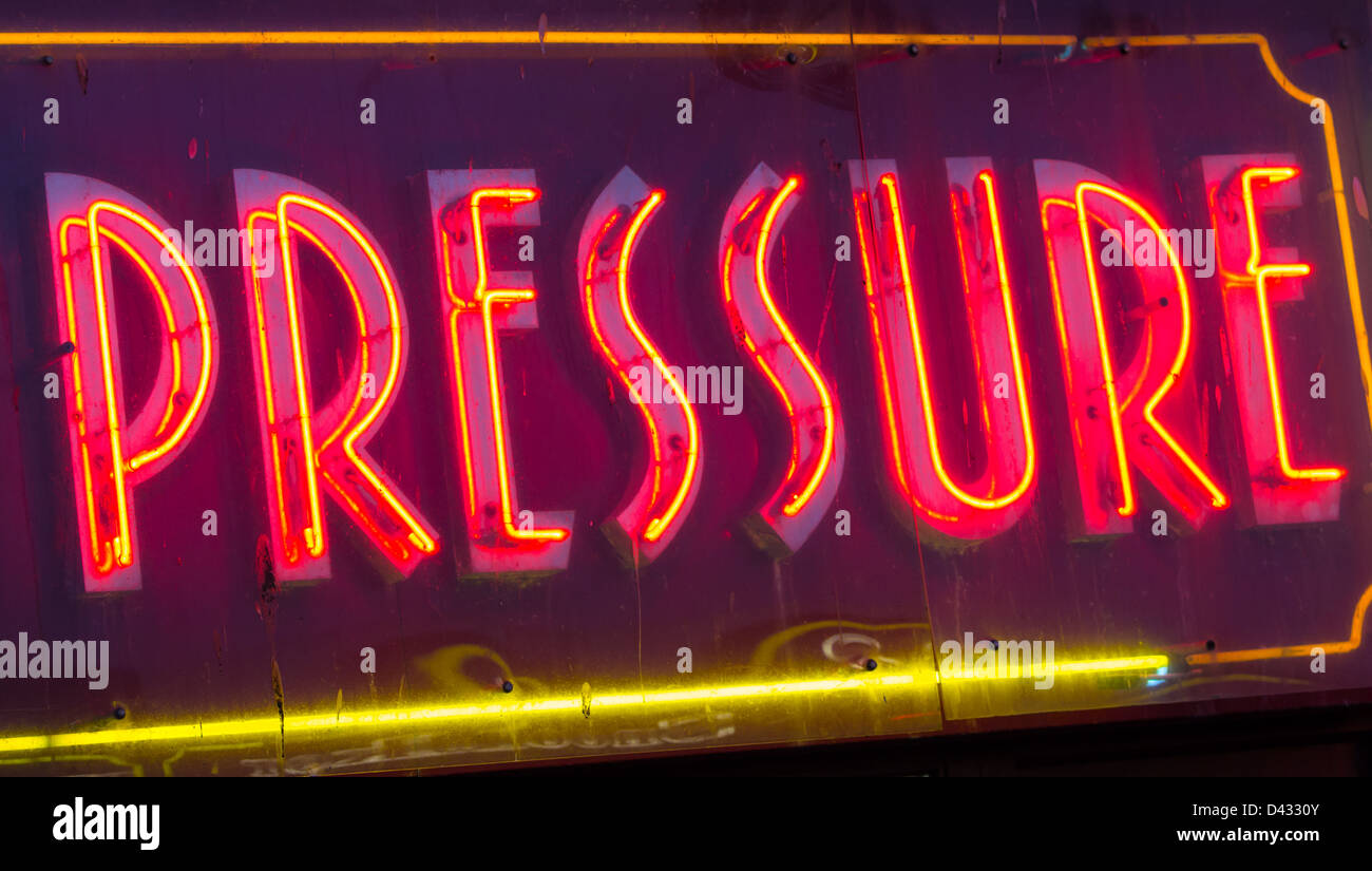 Neon PRESSURE sign Stock Photo - Alamy