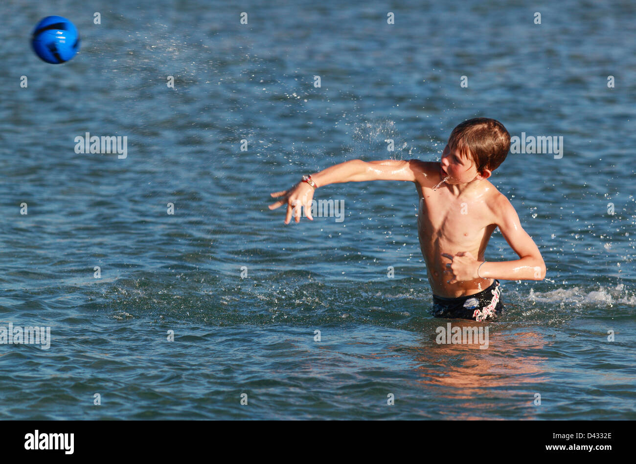 Boy throws a ball hi-res stock photography and images - Alamy