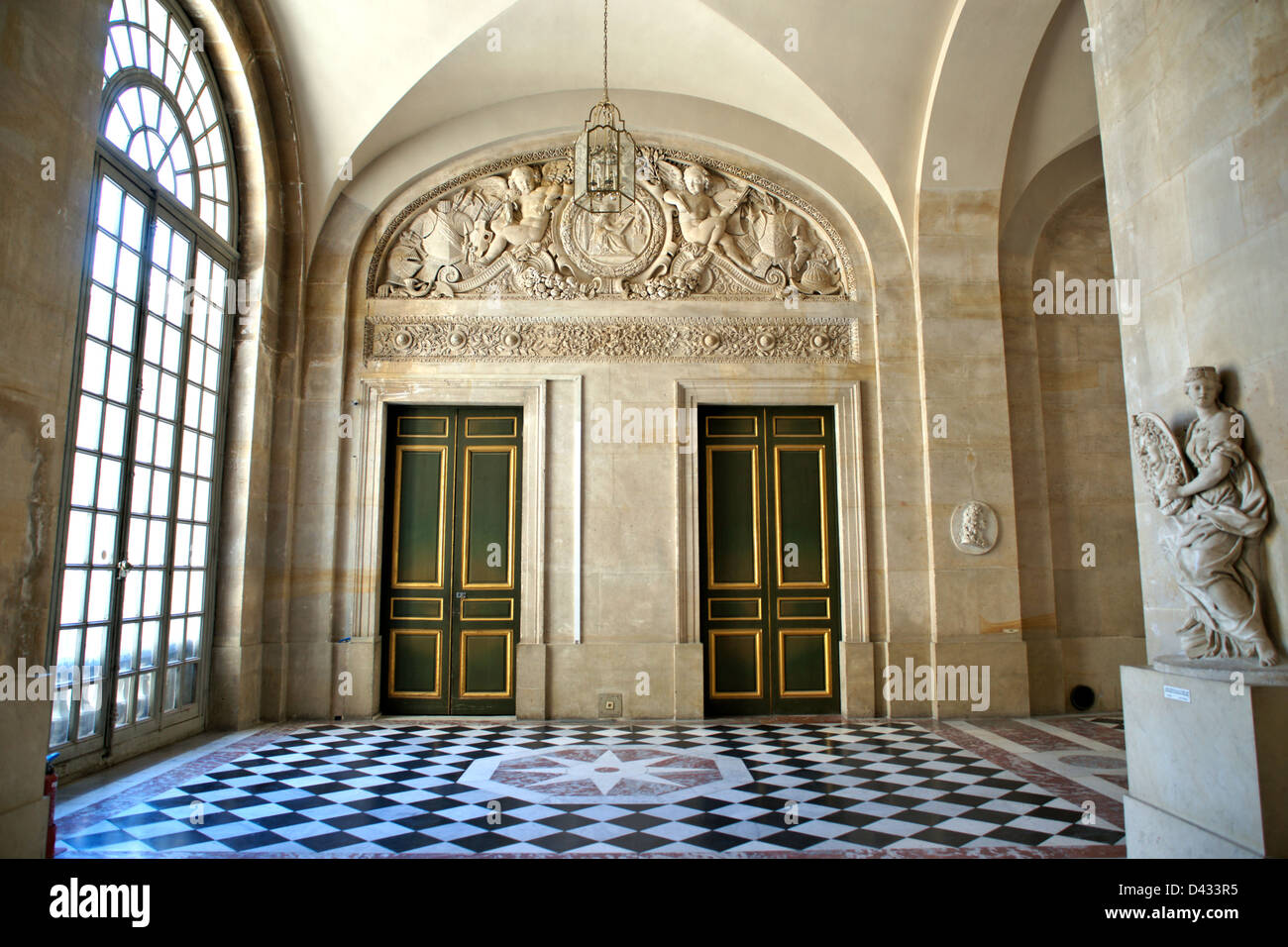 Interior passageway leading to 2 green and gold doors in the Palace of ...