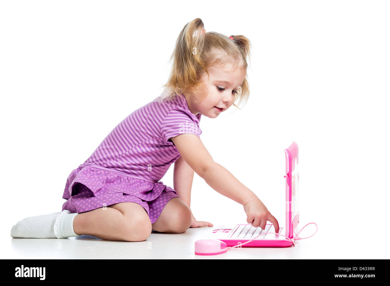funny child playing with laptop toy Stock Photo - Alamy