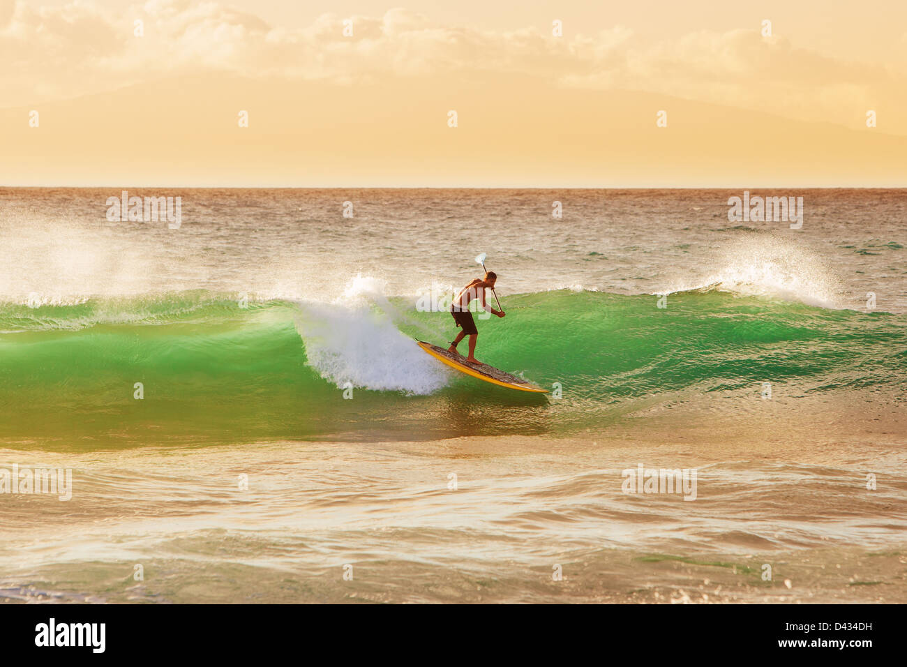Surfer on Beautiful Wave at Sunset Stock Photo - Alamy