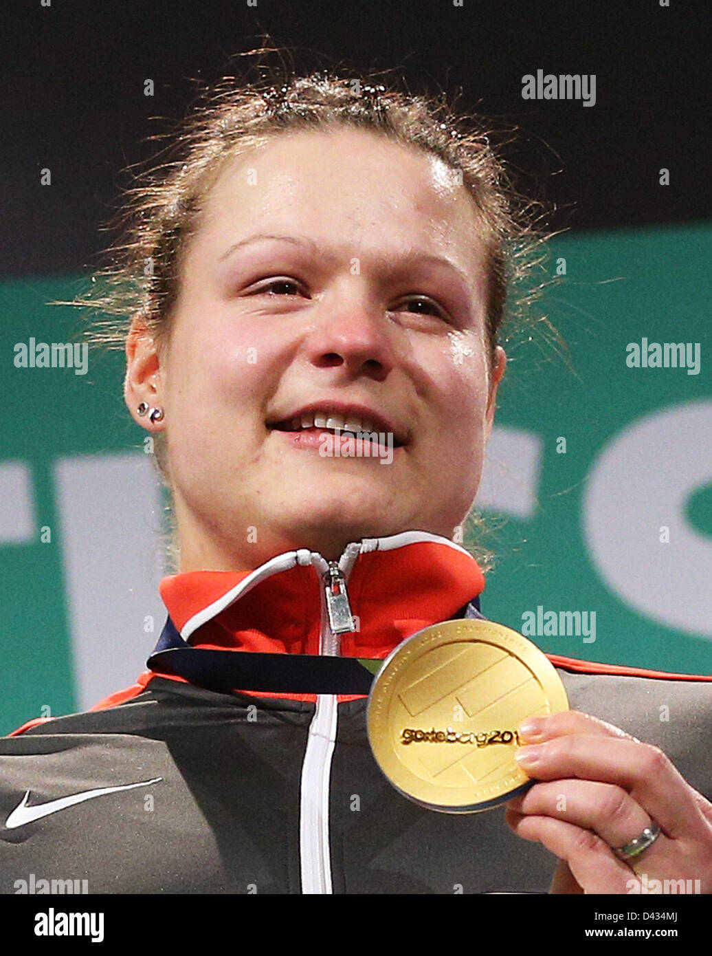 Germany's Christina Schwanitz celebrates with her gold medal in the ...