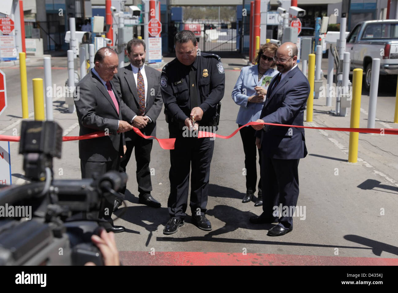 Director of Field Operations Chris Maston cuts the ceremonial red ...