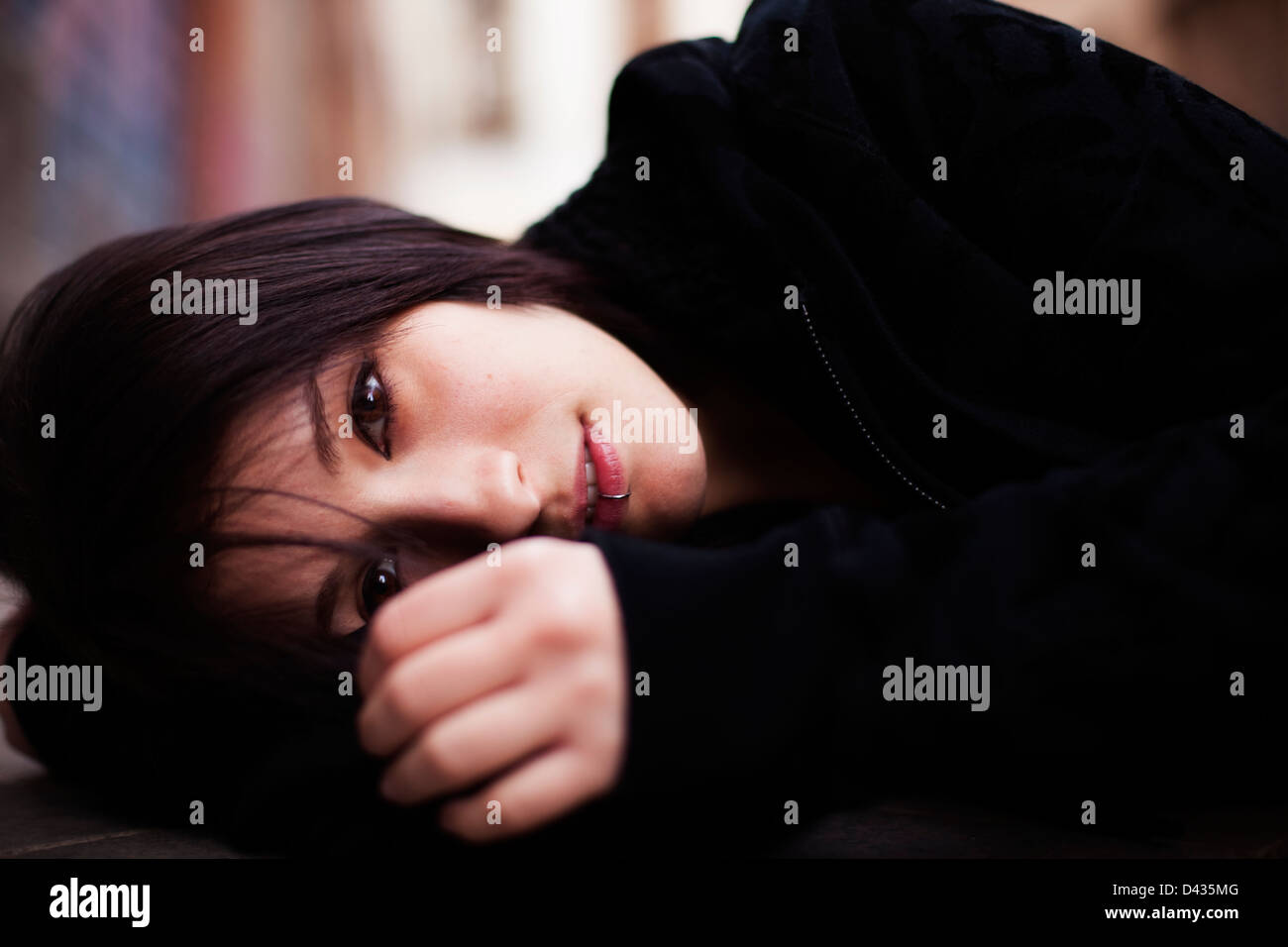 Young beautiful girl staring at camera Stock Photo - Alamy