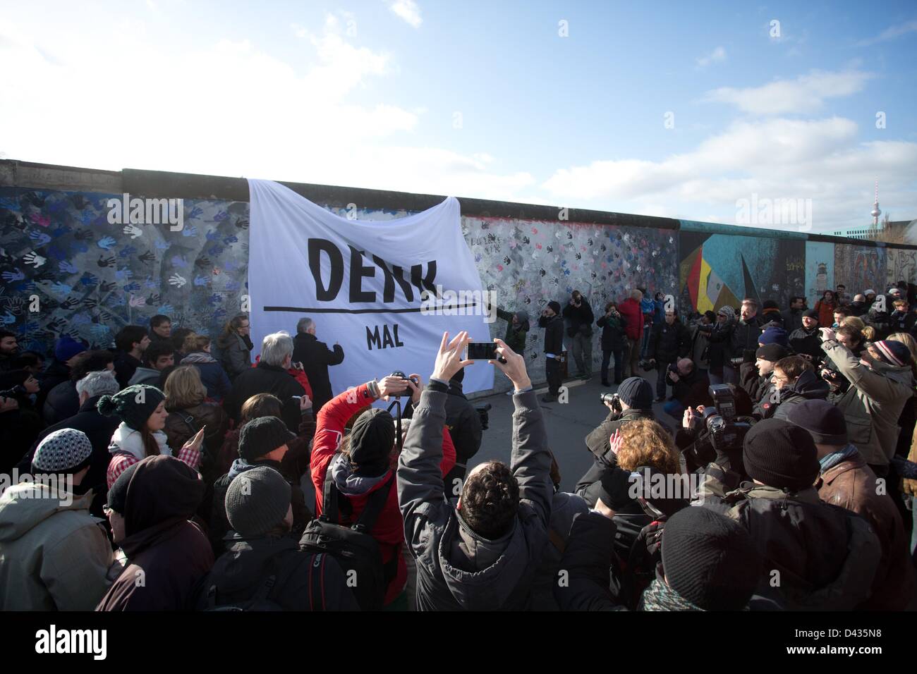People demonstrate against the dismantling of parts of the wall at East ...