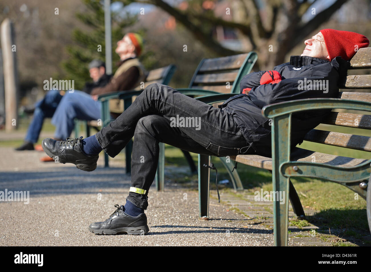 People enjoy the sun during mild temperatures in Freiburg, Germany, 03 ...