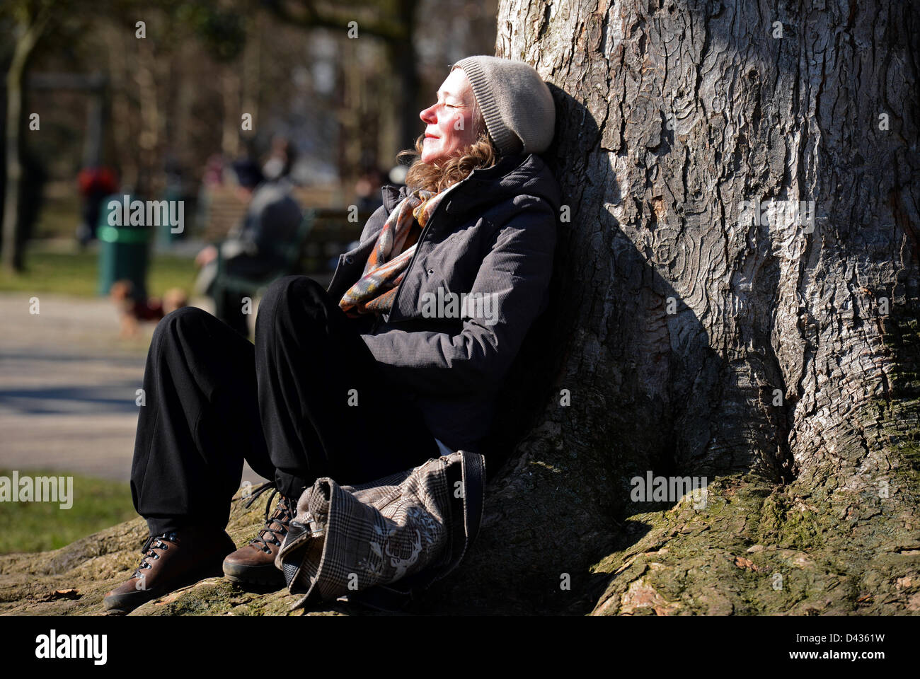People enjoy the sun during mild temperatures in Freiburg, Germany, 03 ...