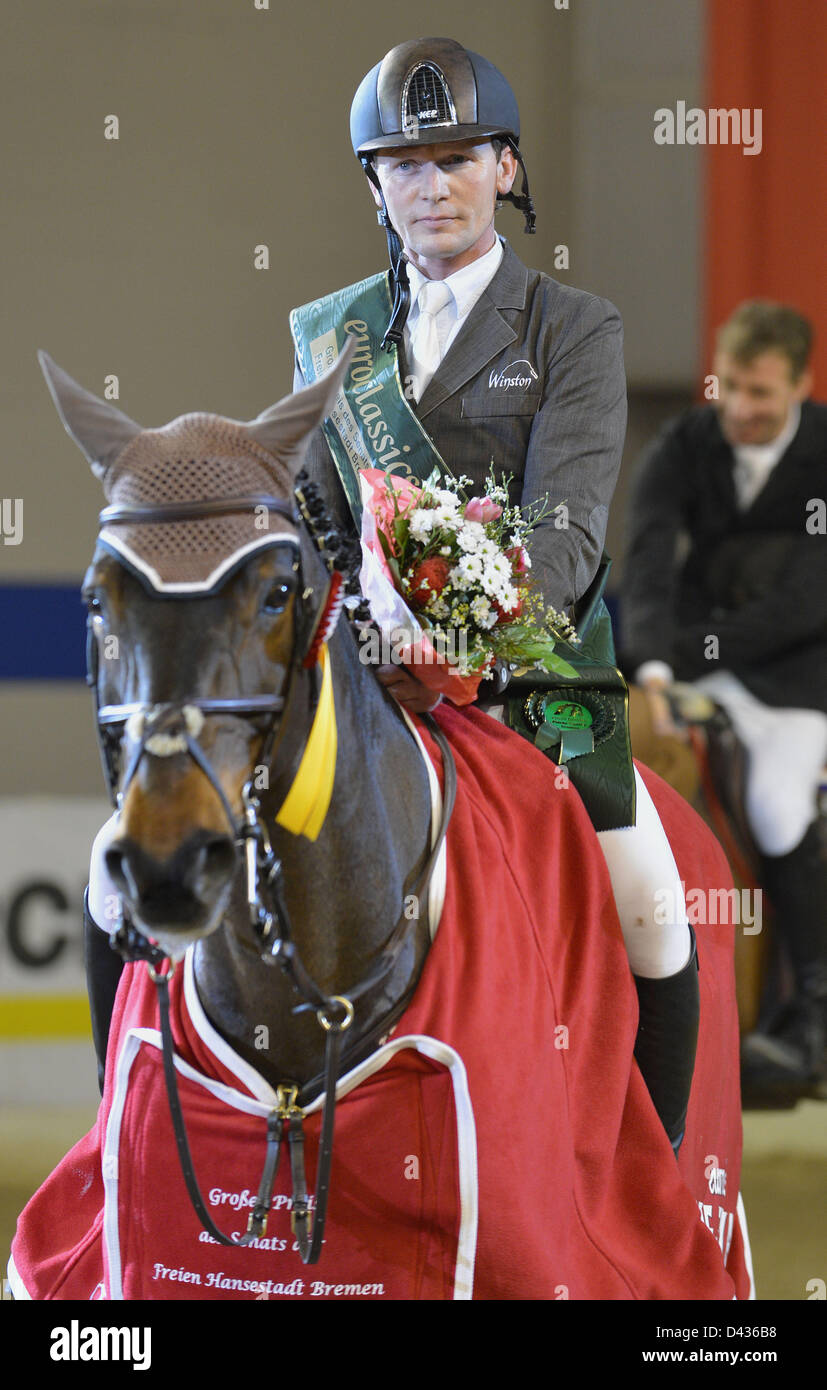 Belgian equestrian Jan Vinckier sits on his horse 'Emilie de Diamant ...