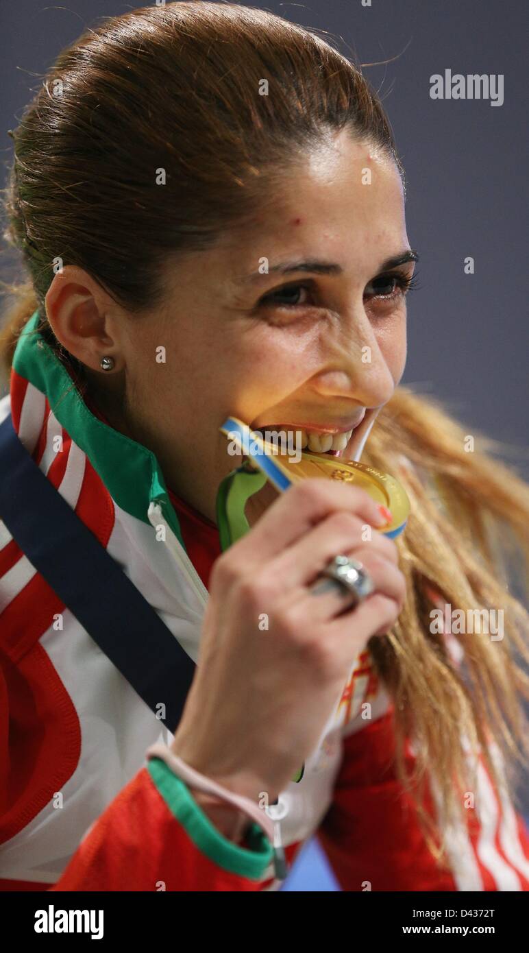 Sara Moreira of Portugal shows her gold medal in the women's 3000 m ...